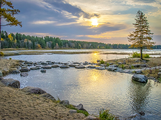 This view stretches into the distance, inviting you to strut your stuff among the pines and reflective waters.