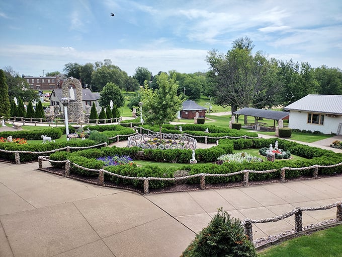 The Dickeyville Grotto's gardens: where nature meets art. Father Wernerus's vision extends beyond stone and glass, creating a serene oasis that complements his dazzling masterpiece.