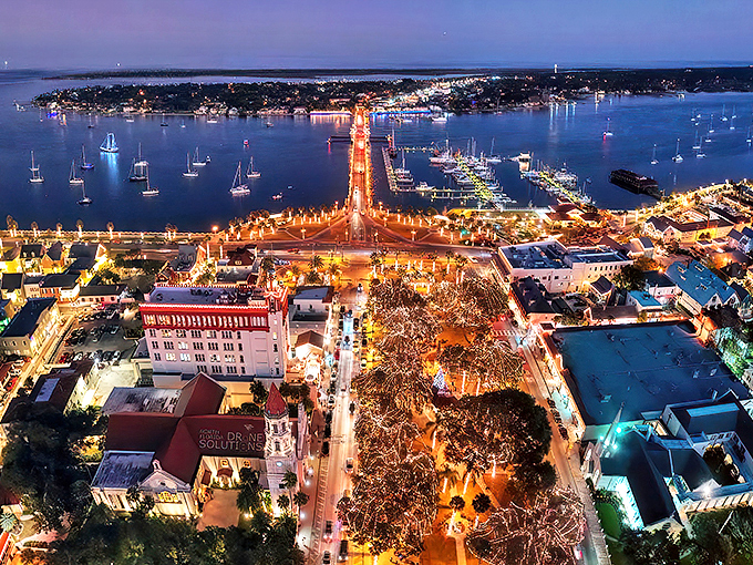 St. Augustine: Where history twinkles! This aerial view showcases the city's dazzling Nights of Lights, turning America's oldest city into a magical holiday wonderland.