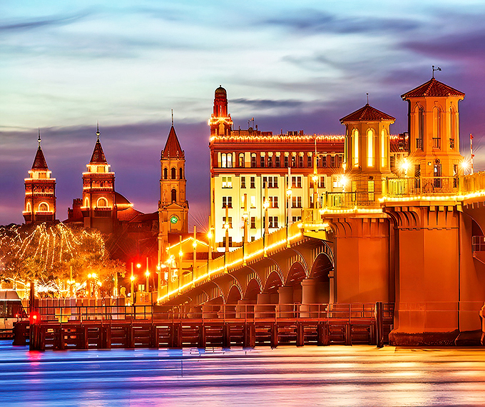 Bridging past and present, St. Augustine's iconic Bridge of Lions glows with festive charm. It's like crossing into a Hallmark movie, Florida-style!