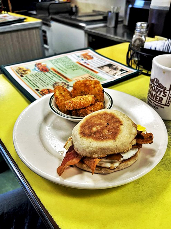Breakfast sandwich with a side of nostalgia. This plate screams "Good Morning!" louder than any rooster ever could.