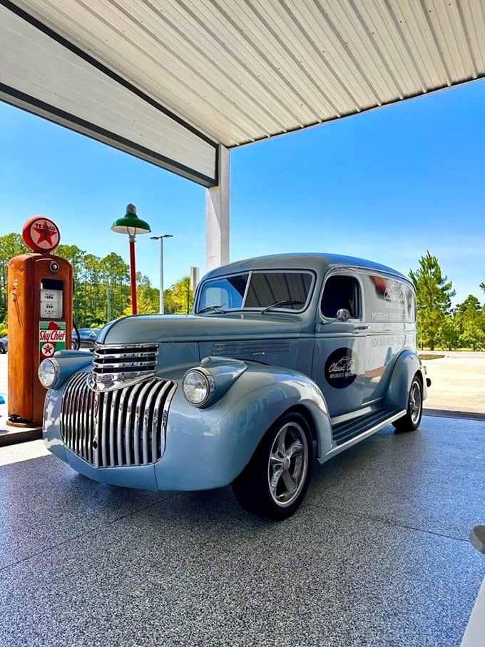 Service with a smile! This vintage delivery van and gas pump duo are serving up a full tank of nostalgia with a side of mid-century charm.