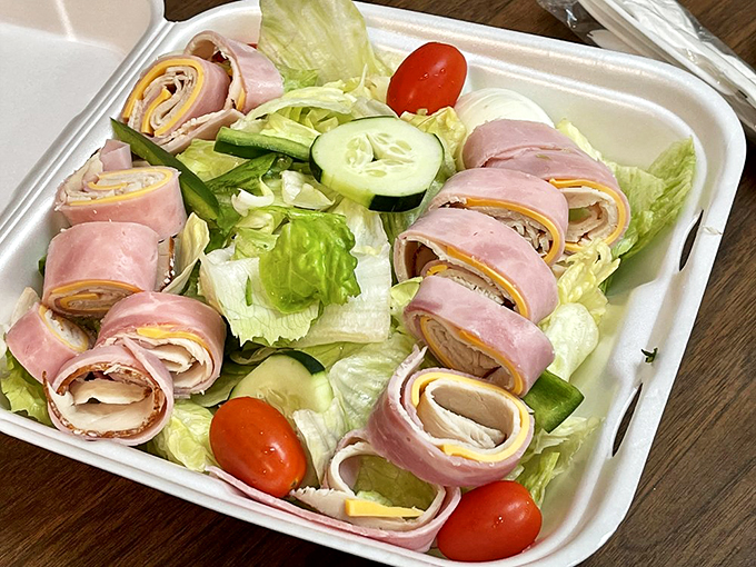 A salad that's anything but boring. Those ham and cheese roll-ups are like little flavor bombs waiting to explode in your mouth.