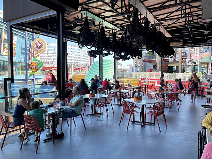 Happy diners, sunny skies, and the promise of great food. This outdoor seating area is the perfect recipe for a memorable meal.