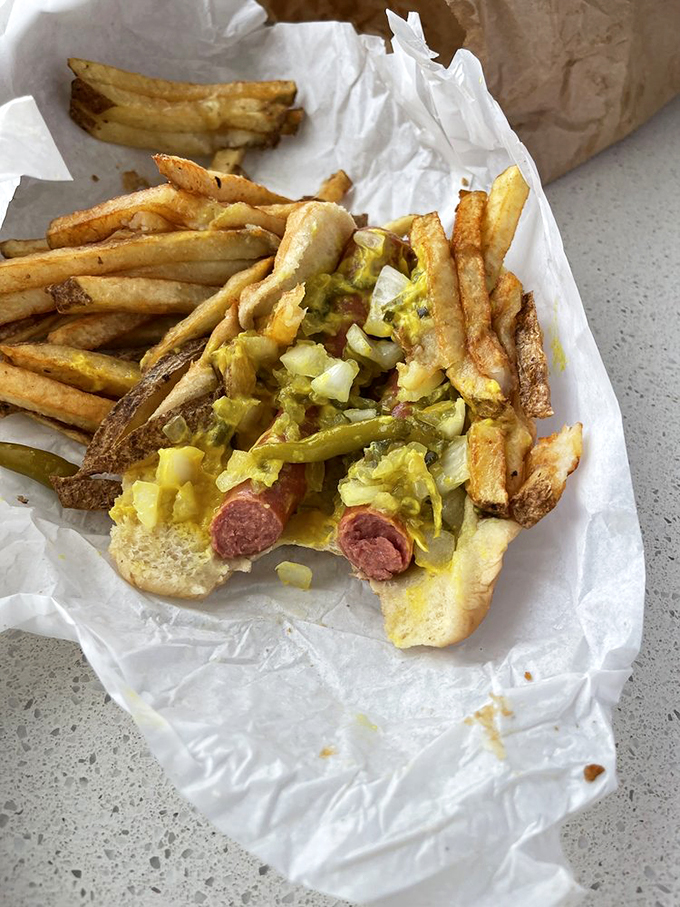 Double the dog, double the fun! This hefty handful is the culinary equivalent of a bear hug from a Chicagoan.