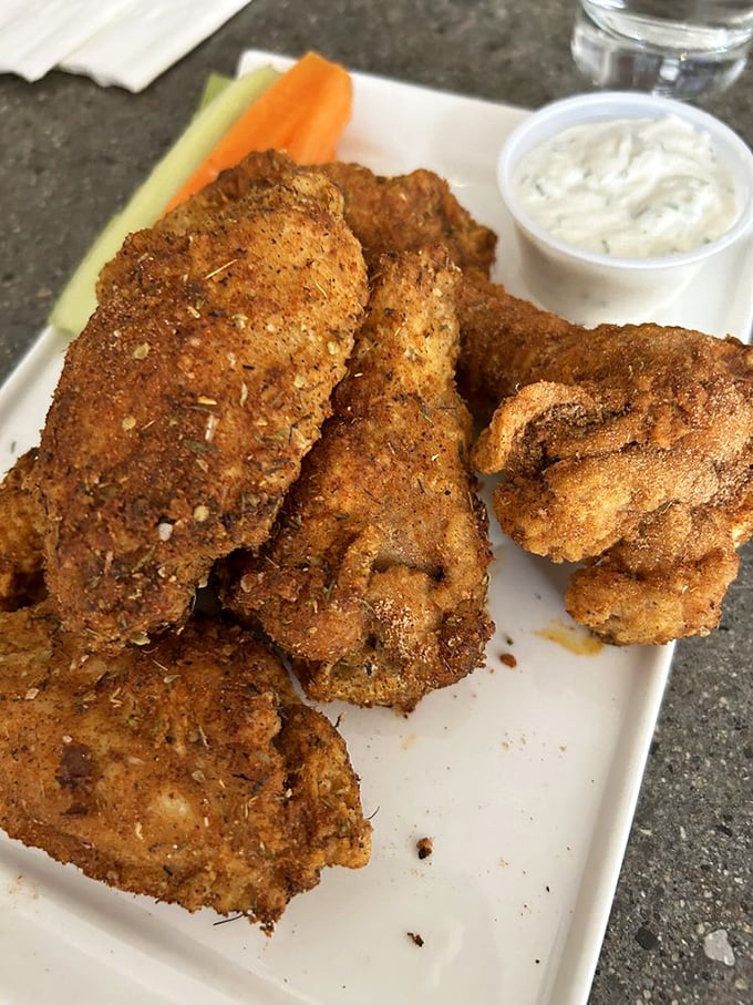 Wings that'll make you sing! Nosh's dry rub wings are a crispy, flavor-packed adventure that'll have you licking your fingers with zero shame.