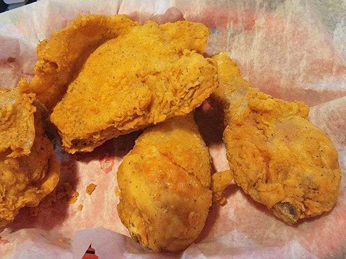 Finger-lickin' fantastic! This fried chicken is so golden and crispy, it could make Colonel Sanders hang up his white suit in defeat.