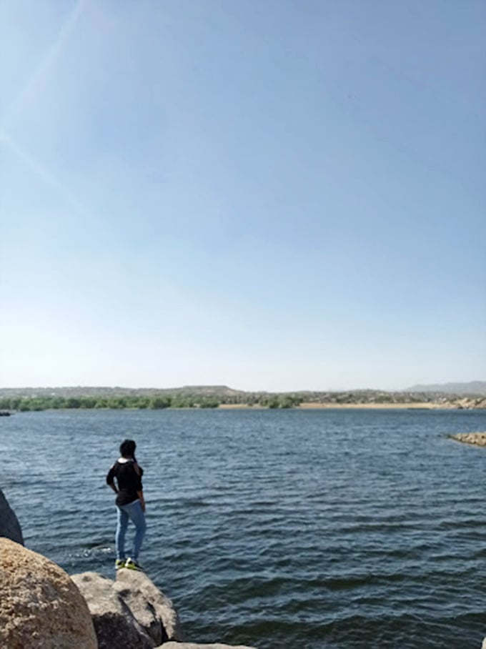 Living on the edge, literally! Sometimes you need to stand on a rock to truly appreciate life's simple pleasures.