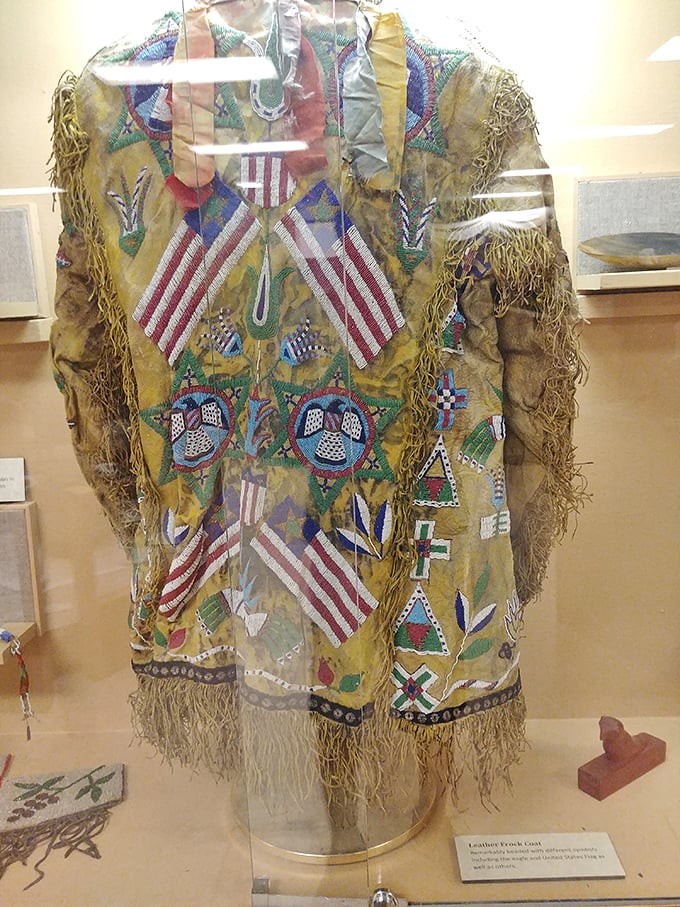 "Fringe benefits, indeed!" This elaborately decorated Native American coat is a wearable work of art that puts modern fashion to shame.