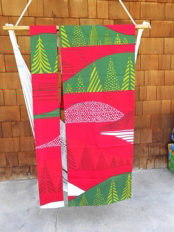 Wrap yourself in Nordic chic! This Marimekko textile is like a wearable aurora borealis, minus the sub-zero temps.