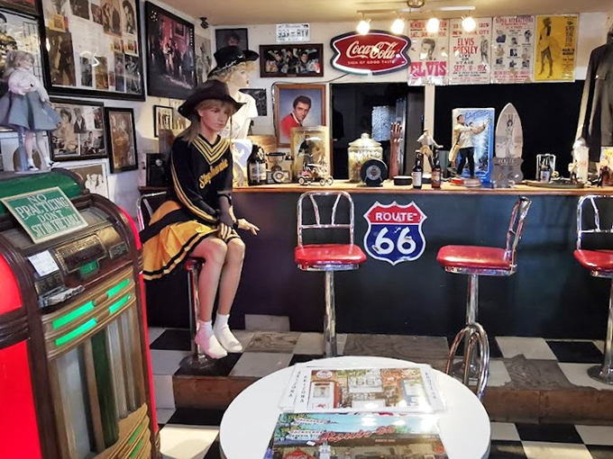 Elvis, Coca-Cola, and Route 66 – the holy trinity of American pop culture, all gathered here in this corner of nostalgia heaven.