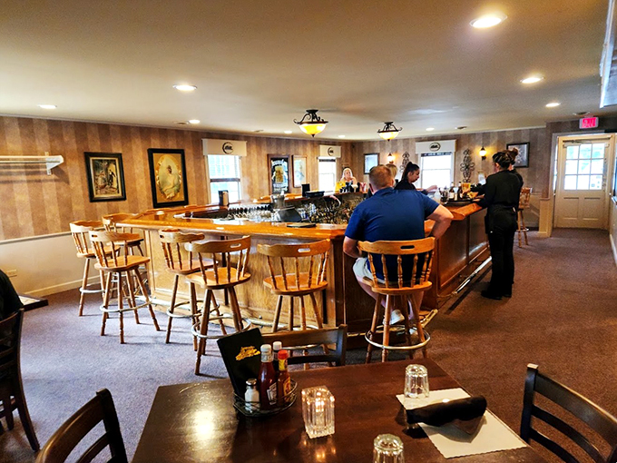 Where spirits meet spirits! This cozy bar area looks like the perfect spot for swapping tall tales and sipping on liquid history.