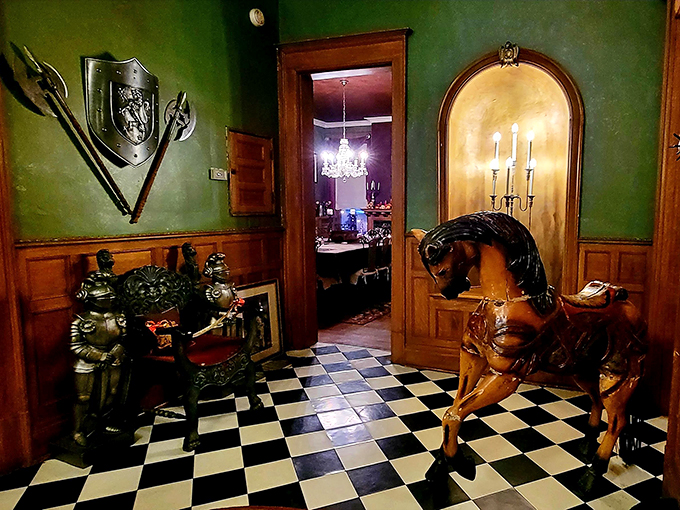 Knights, horses, and checkerboard floors &ndash; oh my! This eclectic entryway is like stepping into a medieval fever dream (in the best way).