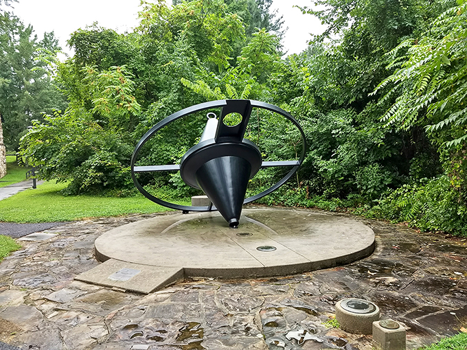 Is it a giant's spinning top or an alien landing pad? Either way, this artwork adds a touch of whimsy to the wilderness.