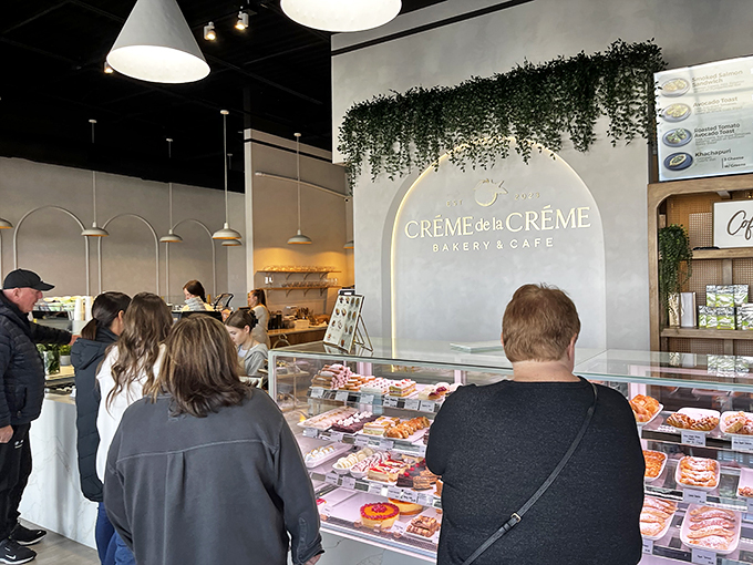 Line up, folks! These patrons know a good thing when they smell it. The early bird gets the warm croissant, after all.