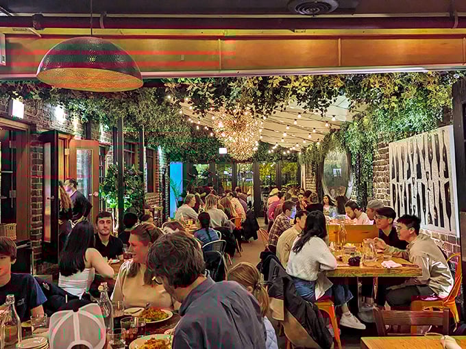 A patio so inviting, even introverts might consider socializing. The secret ingredient? A dash of Spanish charm and strings of twinkling lights.