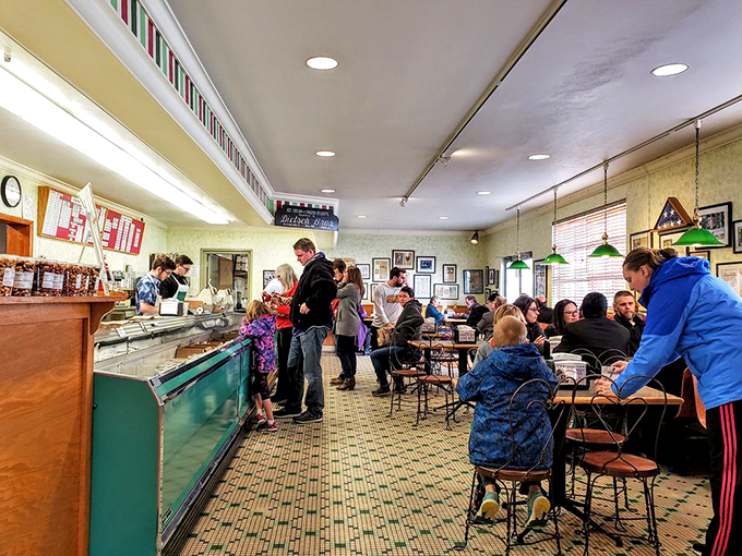 Ice cream brings people together! This bustling scene is like a modern-day Cheers, where everybody knows your favorite flavor.