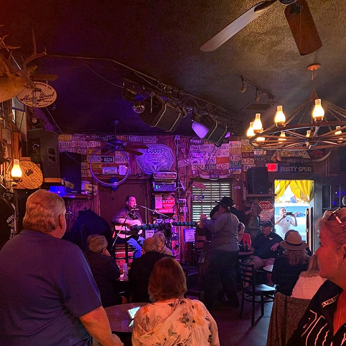 Dim lights, bright tunes&mdash;it's honky-tonk heaven! These folks are two-stepping their way into a night they might not remember, but'll never forget.