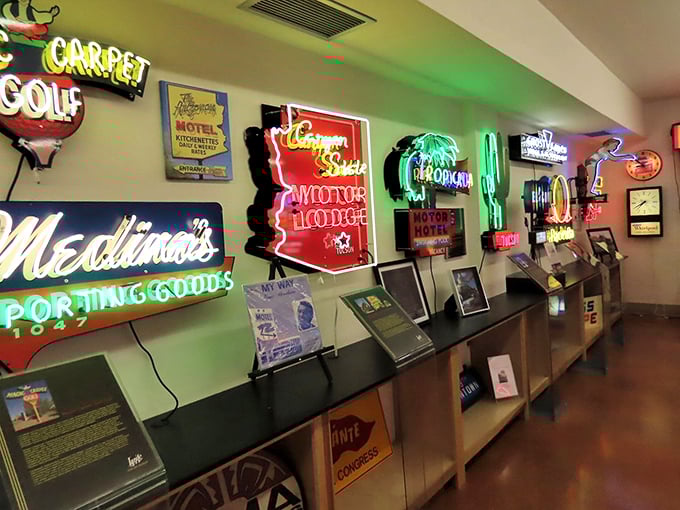 A wall of wonders that puts my refrigerator magnet collection to shame. Each sign tells a story of neon-lit nights and roadside dreams.