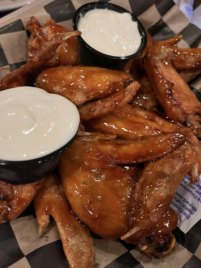 These wings aren't just food; they're an experience. Sticky, sweet, and tangy &ndash; napkins are not optional, they're mandatory!