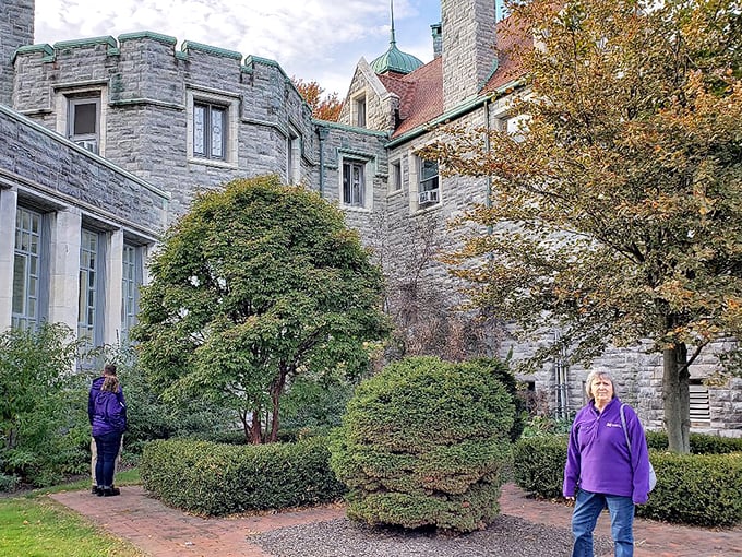 "Purple reign! These visitors are living out their royal fantasies, one stone step at a time."