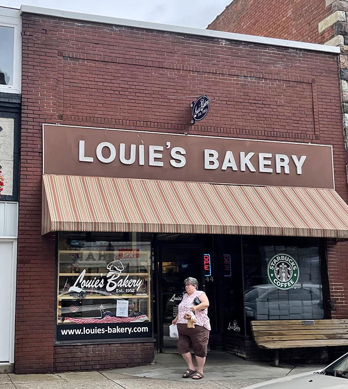 Happy customers are the best advertisement. This lucky patron is about to embark on a sugar-fueled adventure.