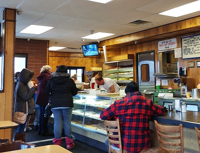 The line forms here for happiness. These patrons know the secret to starting the day right &ndash; with a Biagio's sugar rush.