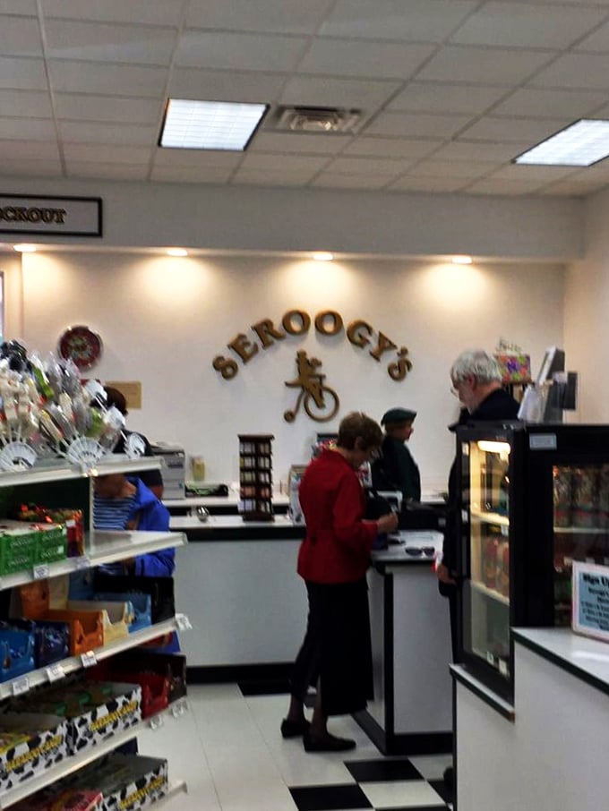 Where chocolate dreams come true! These lucky customers are living the sweet life, surrounded by more cocoa creations than you can shake a candy cane at.