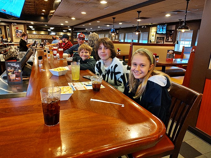 Happy faces all around! This isn't just dinner; it's a family reunion where everyone actually gets along.
