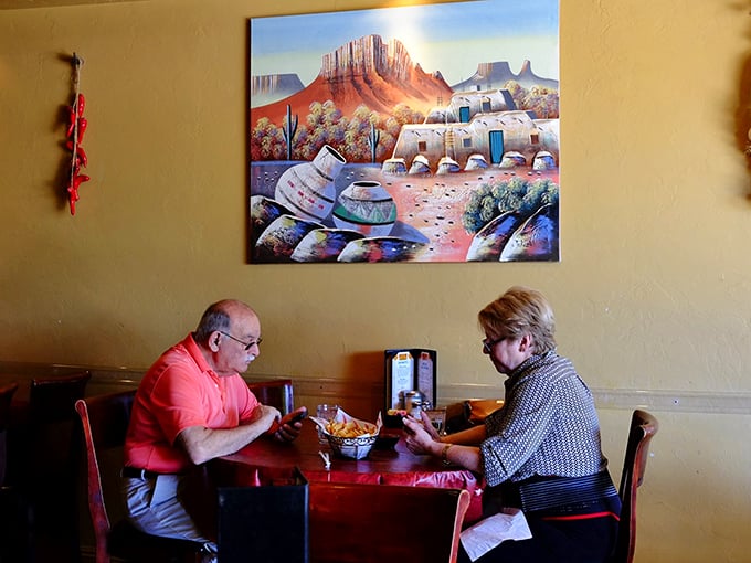 Art appreciation, Southwestern style! These diners are getting a side of culture with their chips and salsa.