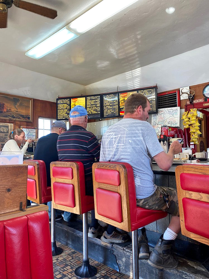 Where everybody knows your name... or at least your usual order. These red stools have cradled the bottoms of happy diners for generations.