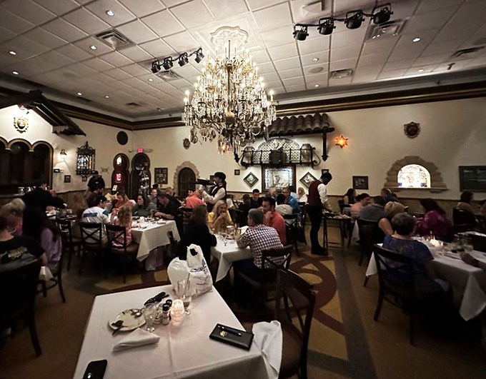 Happy diners, sparkling chandeliers, and enough ambiance to film a telenovela. Just another night at Columbia Restaurant, where every meal is an event.