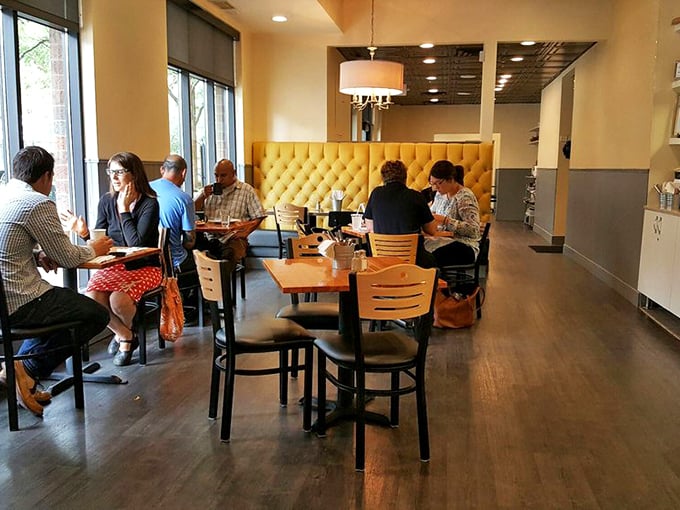 Cozy booths and warm wood tones set the stage for epic brunch battles and syrup-soaked surrenders.