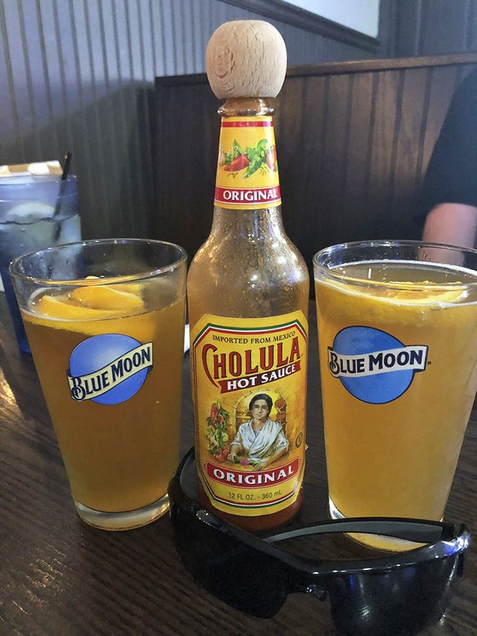 Thirst-quenching trio! Blue Moon's citrusy notes pair perfectly with Cholula's kick, creating a flavor fiesta that'll have your taste buds doing the cha-cha.