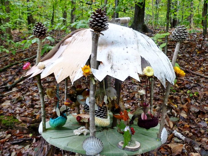 Step right up to the world's most whimsical merry-go-round! Who needs horses when you've got pinecones and seashells? Mary Poppins would approve.