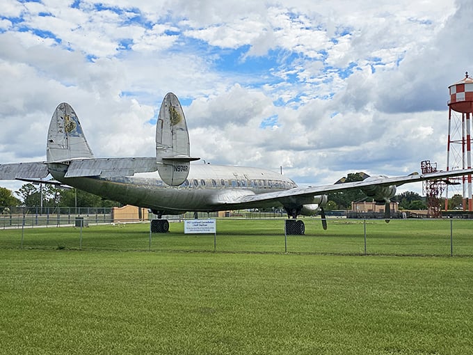 Parked outside like a giant silver bird, this plane seems to be saying, "Take me to your leader... or at least to the nearest runway."