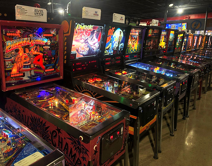 Pinball machines lined up like soldiers, ready for battle. Each one a portal to a different world of flippers, bumpers, and nostalgia.