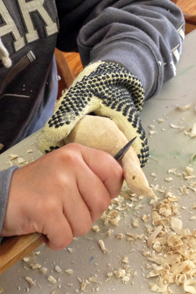 Watching skilled hands transform wood into wings – where craftsmanship meets passion in the art of bird carving.