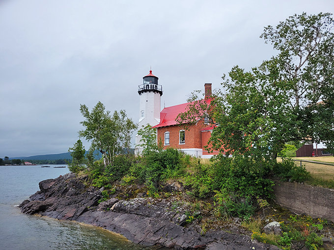Copper Harbor: End of the road, start of the adventure. This lighthouse view is like a siren call for wanderers and wonder-seekers.