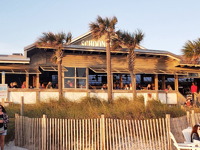Sun-kissed wood, swaying palms, and seafood that practically swims to your plate. Schooners is the Florida dream, served fresh daily.