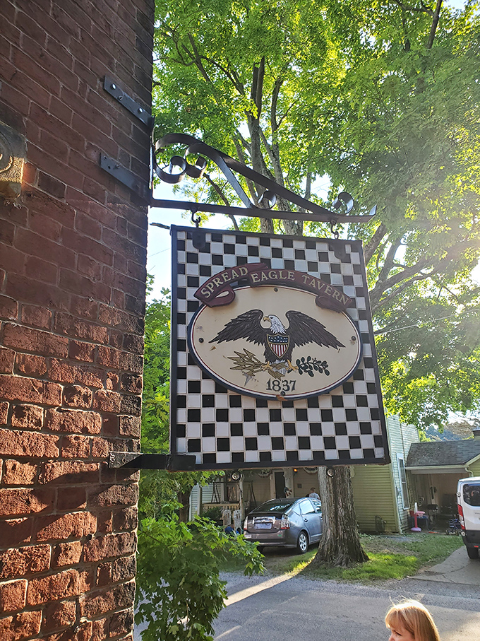 "Stars, stripes, and savory delights: The Spread Eagle's sign promises a patriotic palate pleaser."