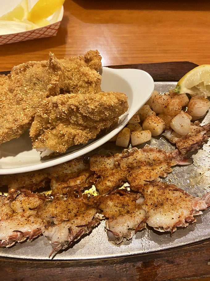 The catfish combo: Where crispy meets succulent. It's like a seafood variety show on your plate, and you've got front row seats.