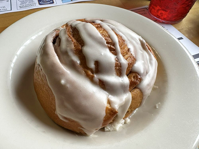 Cinnamon roll the size of your dreams. Gooey, glazed, and guaranteed to make you forget about your diet.