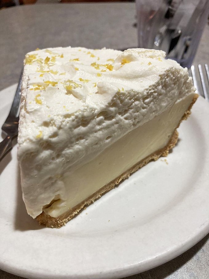 Lemon cream pie so light and airy, it might float away if not for that buttery crust keeping it grounded. Pucker up, buttercup!