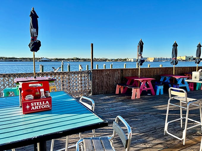 Ocean views and colorful hues - this outdoor seating area is serving up ambiance with a side of sea breeze.