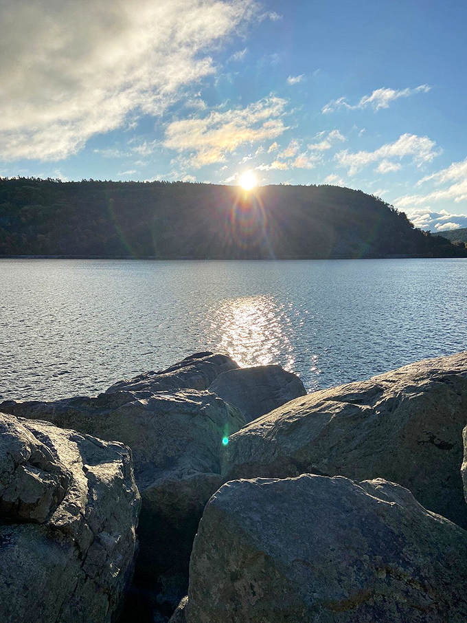 Sunset goals achieved! Who needs Netflix when you've got nature's own light show reflecting off these ancient rocks?