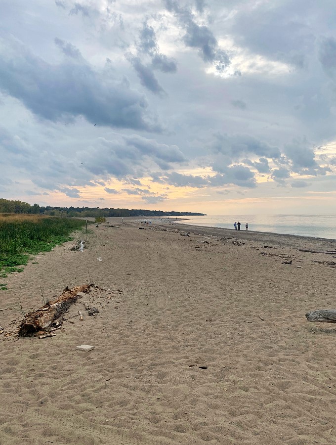 "Sun, sand, and silhouettes &ndash; oh my! This beach scene is like a real-life watercolor painting, with Lake Erie as the artist's canvas."
