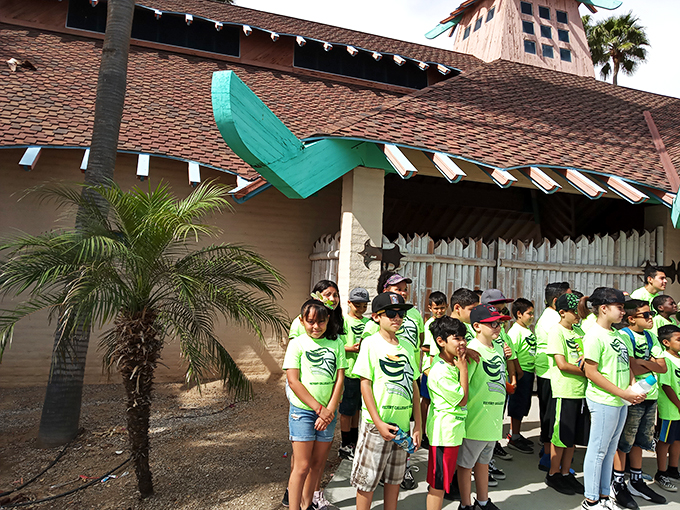Green team assemble! These young explorers are ready to embark on a wild educational adventure.