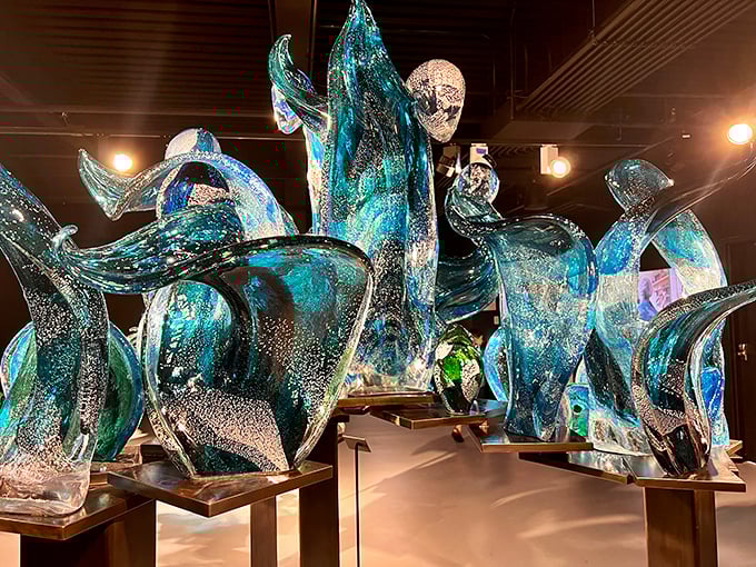 Riding the glass wave! These sculptures capture the ocean's essence so well, you might want to grab a surfboard. Cowabunga, dude!