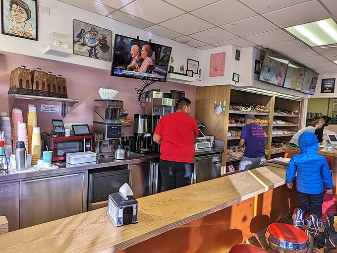 The unsung heroes of happiness! These dedicated staff members are like Willy Wonka's Oompa Loompas, but with better working conditions and no unsettling songs.